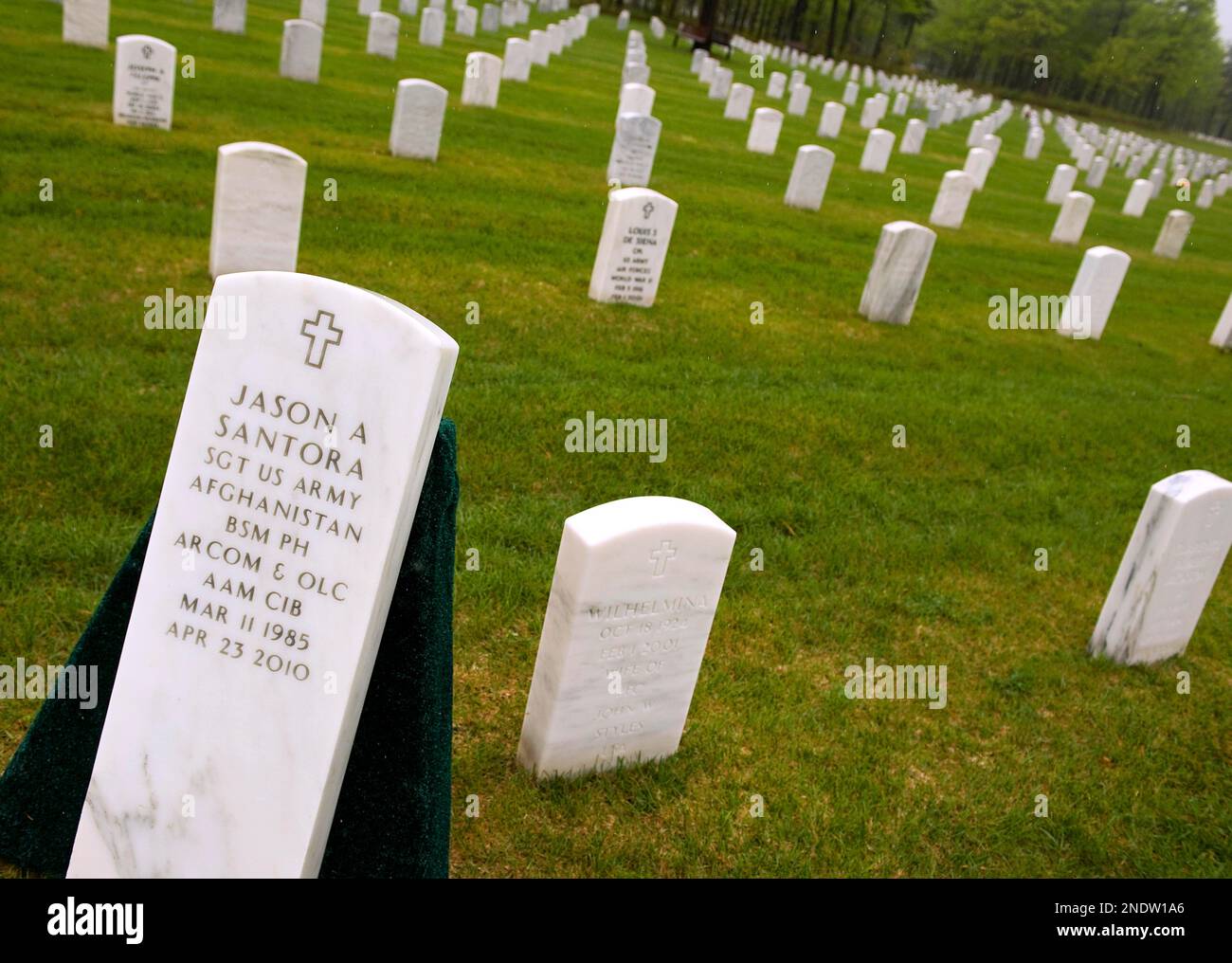 The headstone of US Army Ranger, Sgt. Jason Santora awaits placement ...