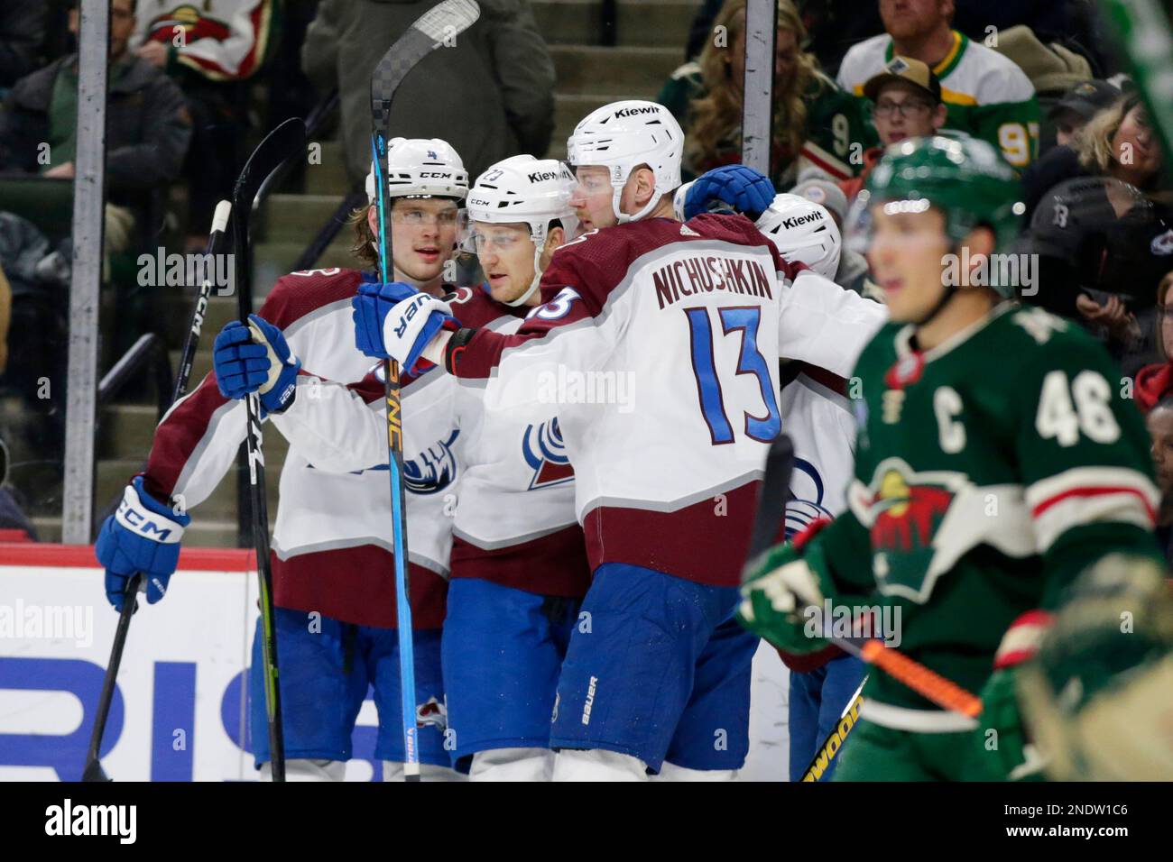 Colorado Avalanche's Nathan MacKinnon (29) is congratulated by Bowen ...