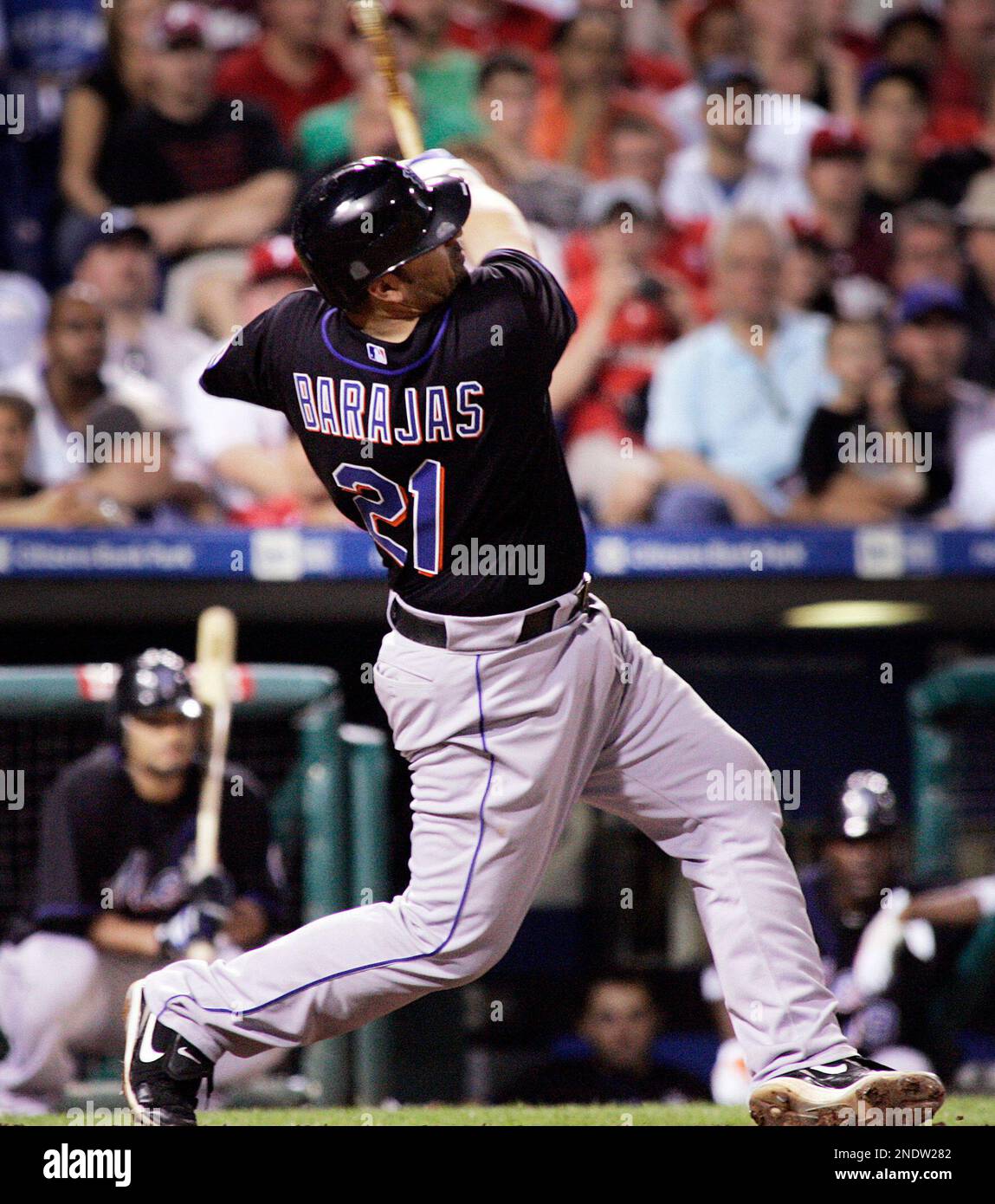 New York Mets' Rod Barajas follows thru on his swing connecting for a ...