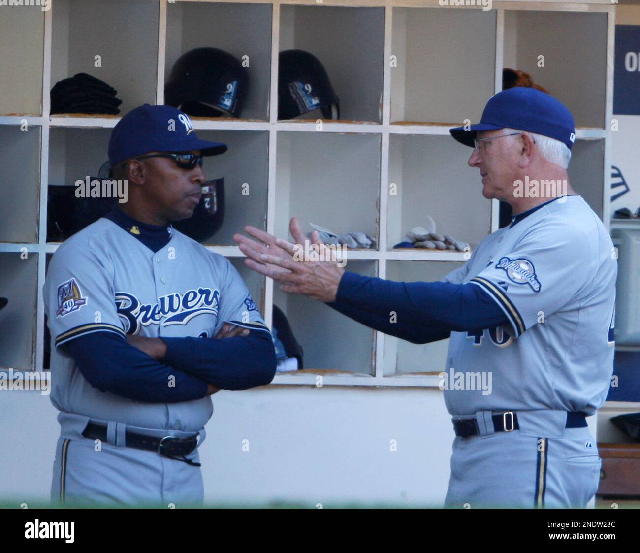 Milwaukee Brewers manager Ken Macha, right, talks with bench coach ...