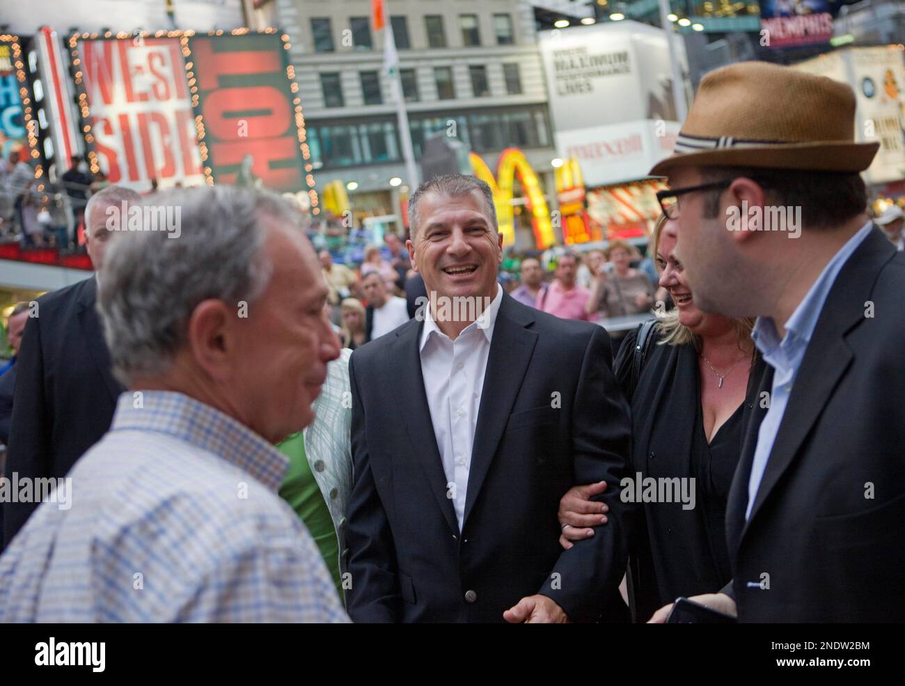 New York mayor Michael Bloomberg, left, leaves a press conference with ...