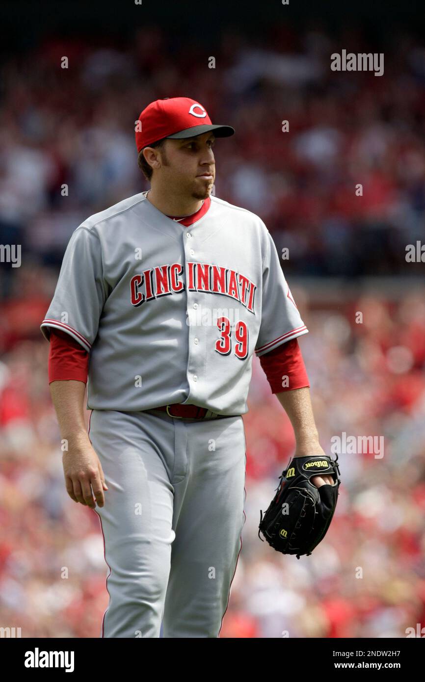 Cincinnati Reds starting pitcher Aaron Harang walks off the field ...