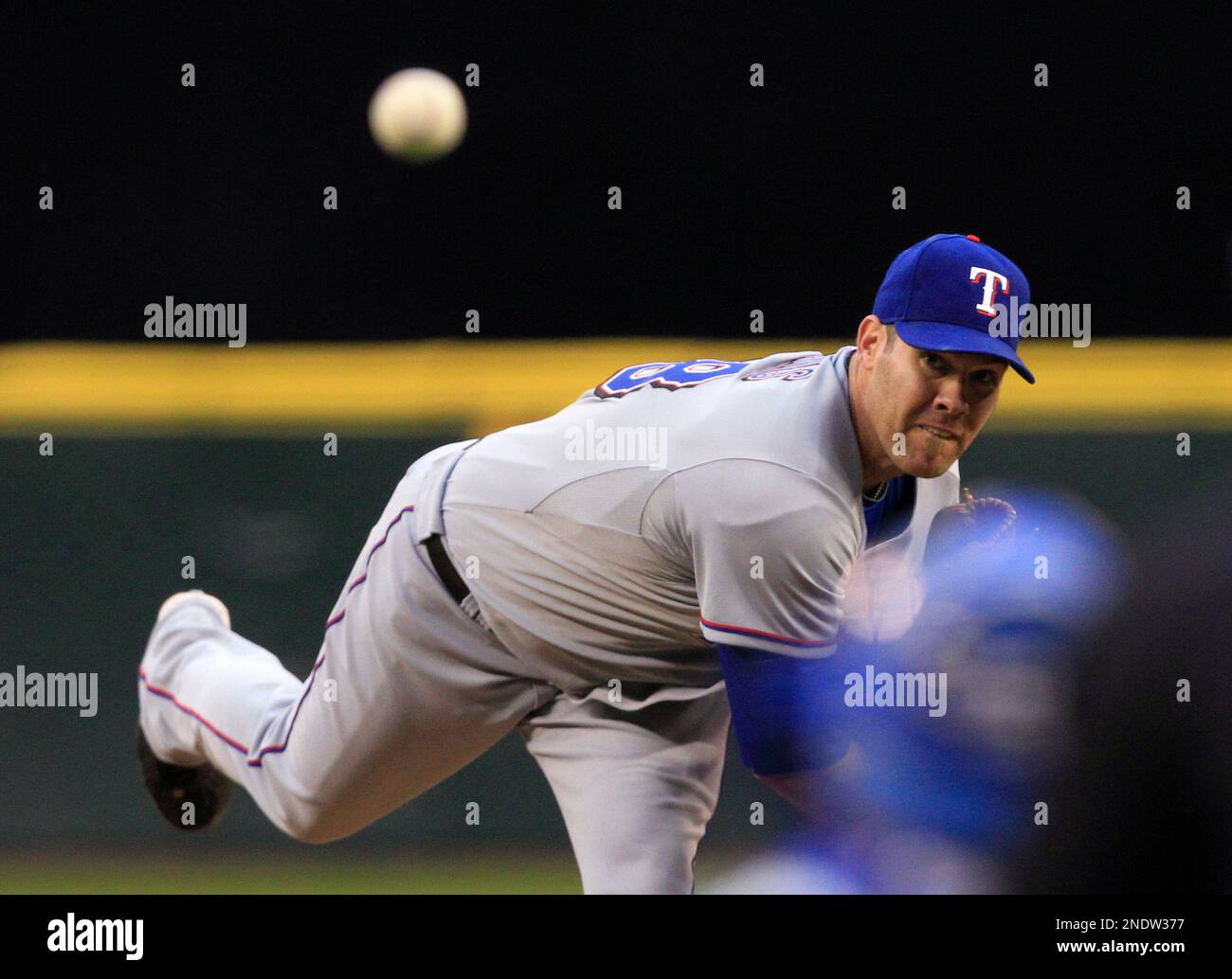 Texas Rangers starting pitcher Colby Lewis throws against the Seattle ...