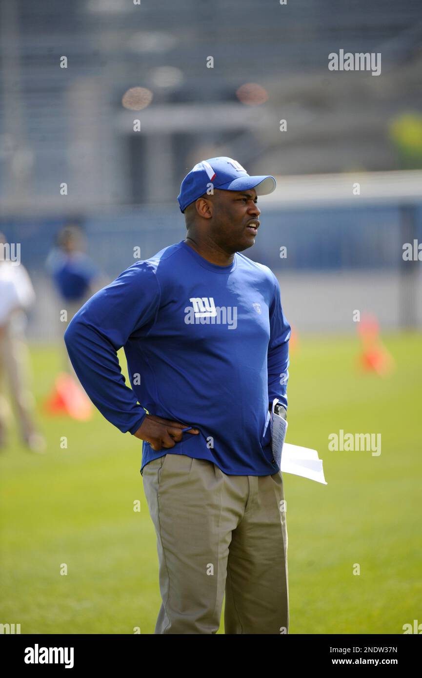 New York Giants defensive coordinator Perry Fewell looks on at rookie NFL football mincamp ...