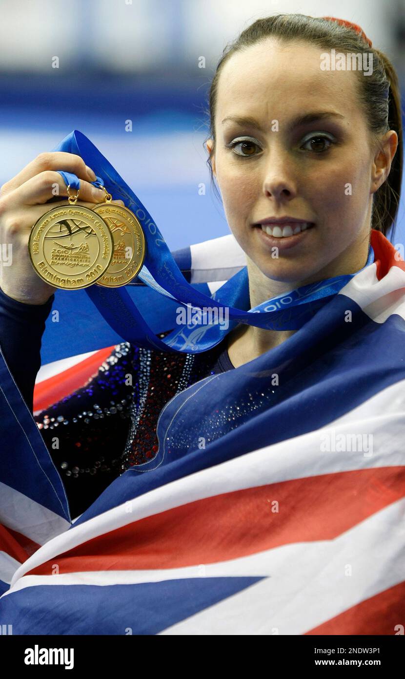 Elizabeth Tweddle of Britain displays her two gold medals for the ...