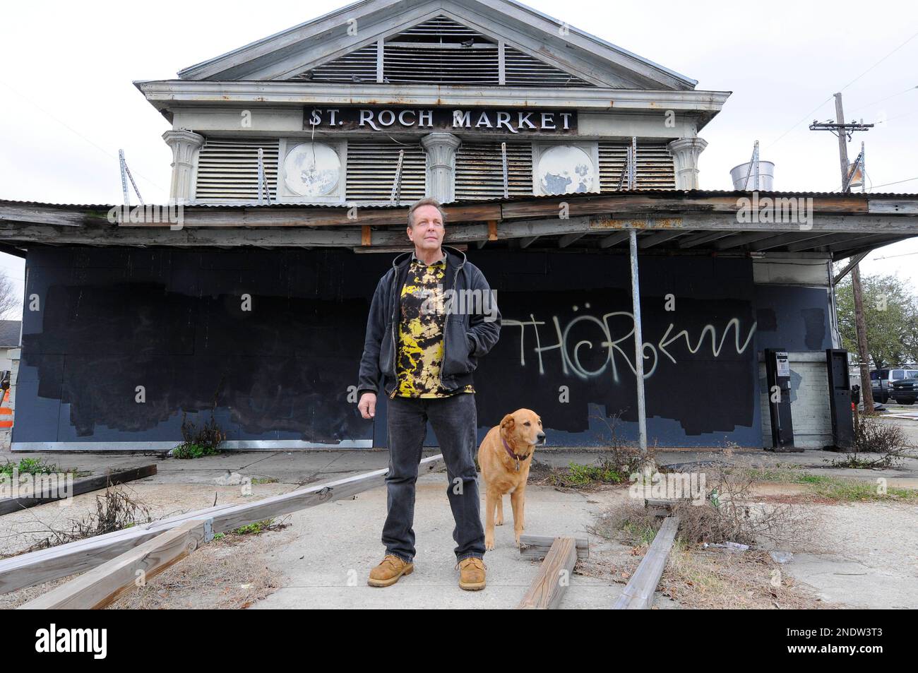 John Victorson, owner of St. Roch Tavern, poses in front of the ...