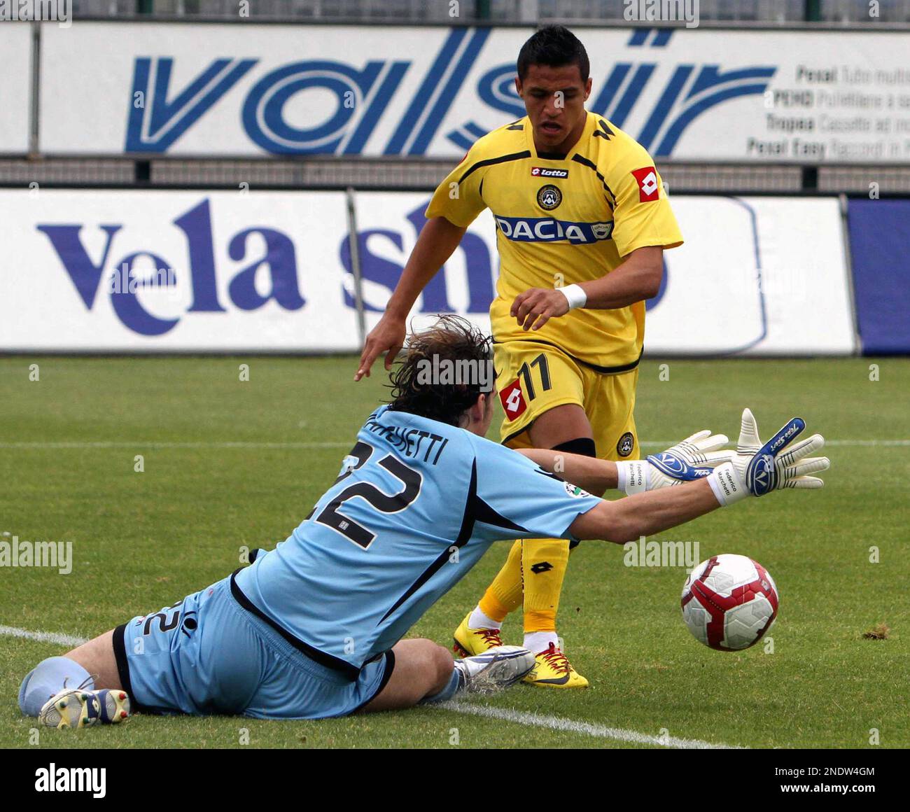Cagliari's goalkeeper Federico Marchetti, left, and Udinese forward ...