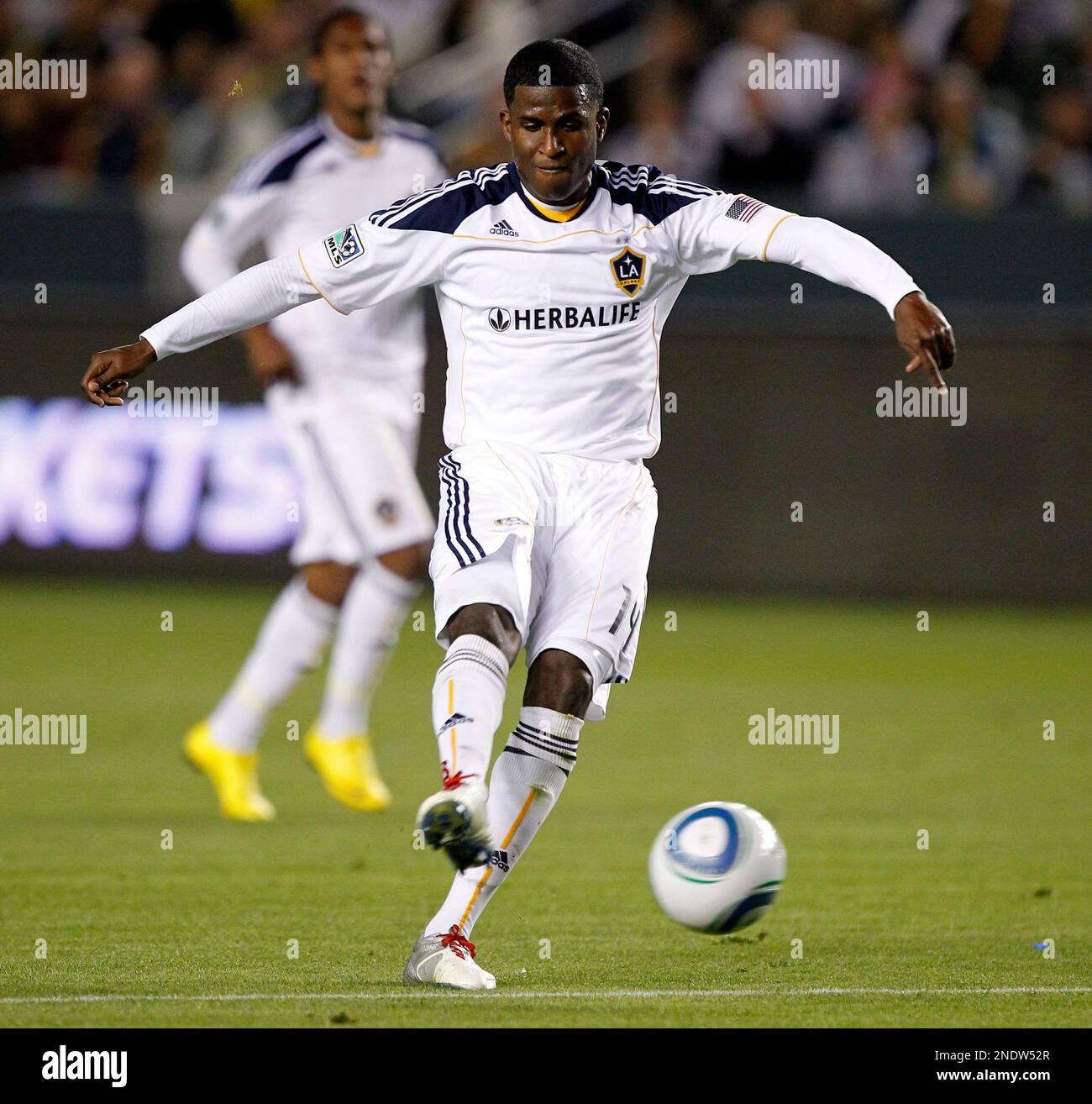 Los Angeles Galaxy forward Edson Buddle (14) takes a shot against ...