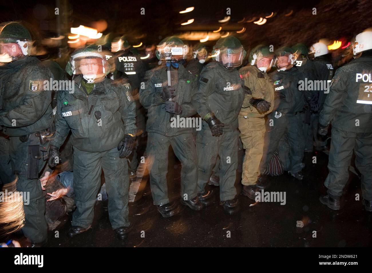 German riot police stand in formation during a left-wing demonstration ...