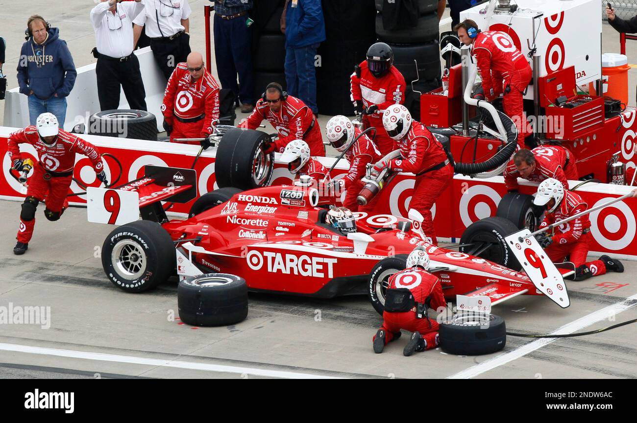 IRL driver Scott Dixon (9) takes a pit stop during the Road Runner ...