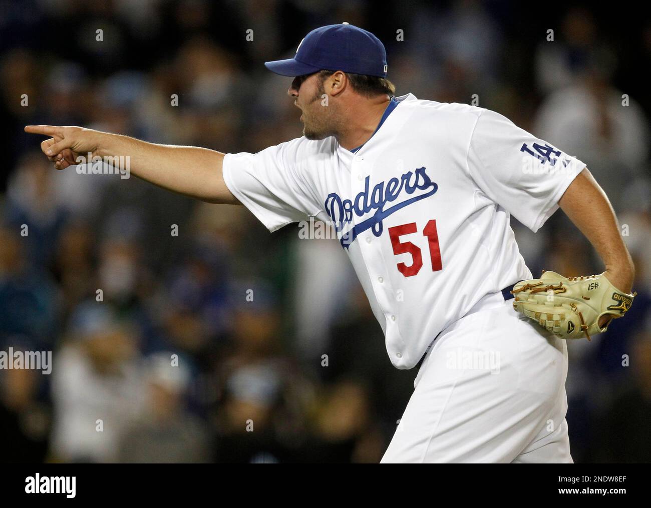 Los Angeles Dodgers relief pitcher Jonathan Broxton reacts after their ...