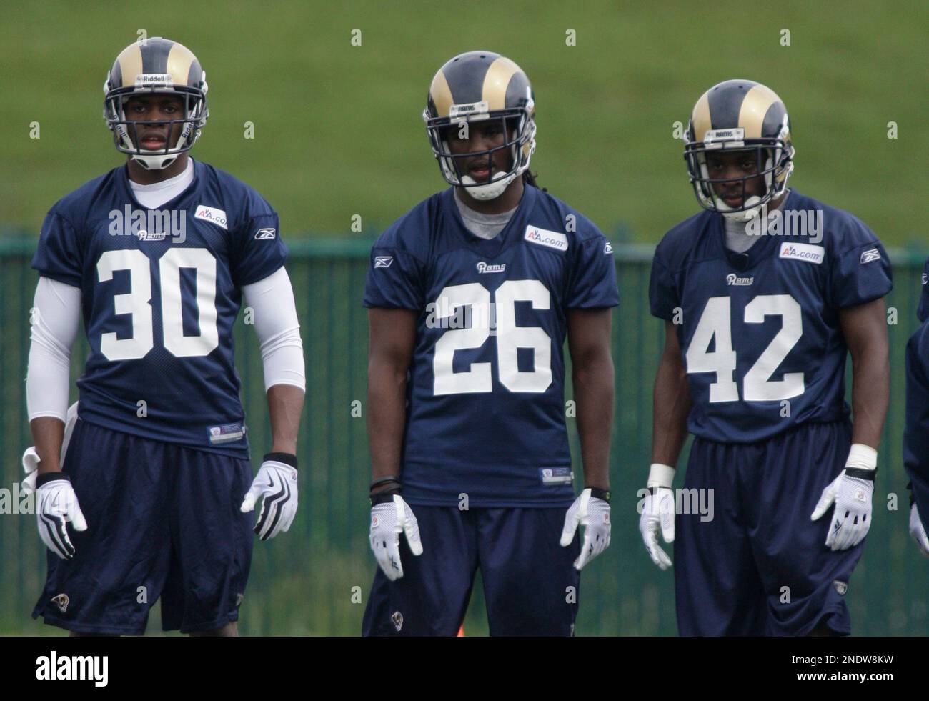 St. Louis Rams, from left to right, Marcus Brown, Jerome Murphy and ...