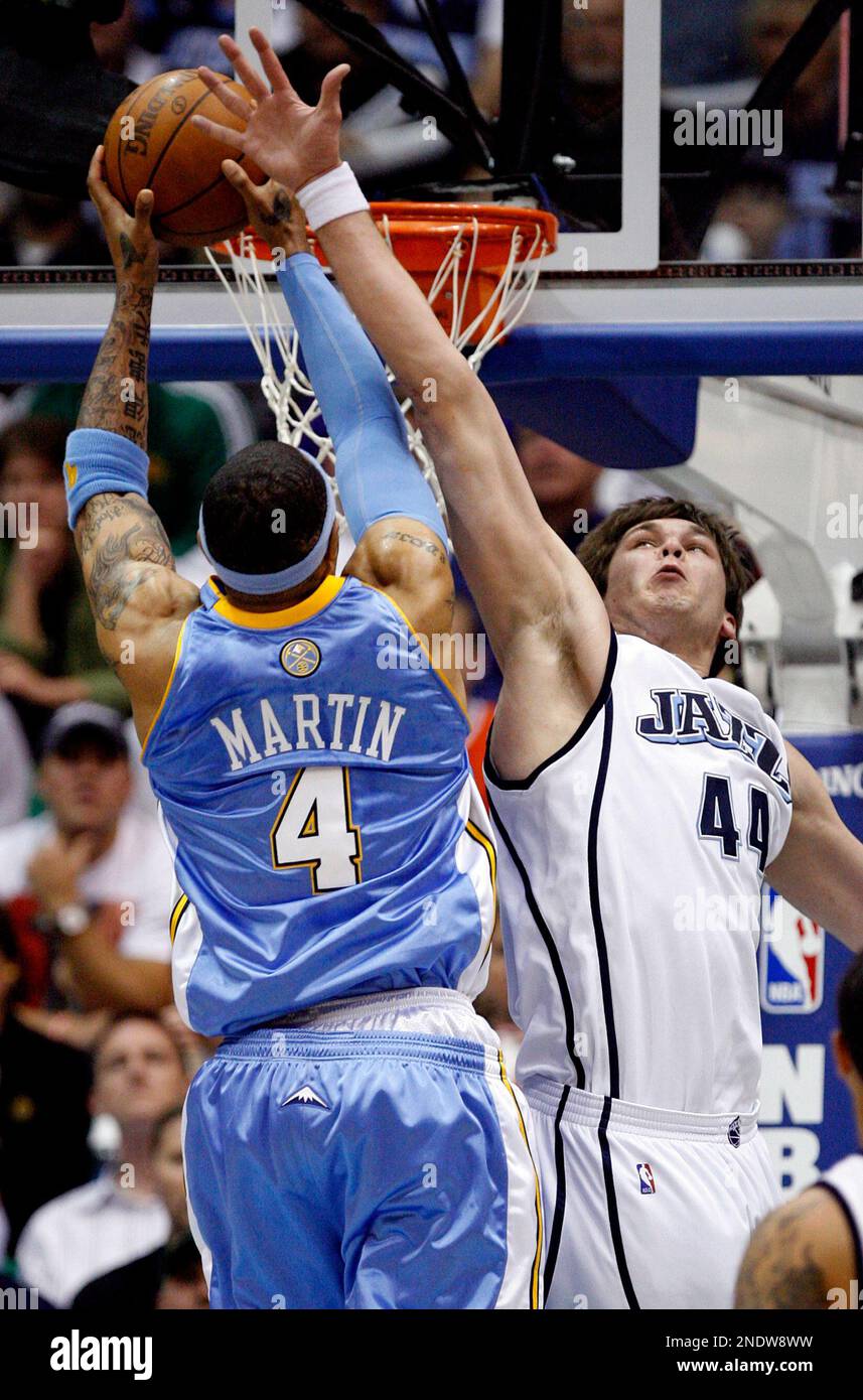 Denver Nuggets forward Kenyon Martin (4) shoots as Utah Jazz center ...