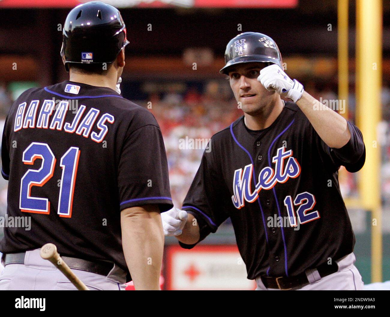 New York Mets' Jeff Francoeur, right, is greeted by Rod Barajas after ...