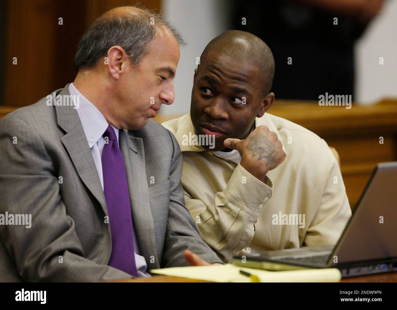 Willie Clark, right, confers with his attorney Abraham Hutt during a ...