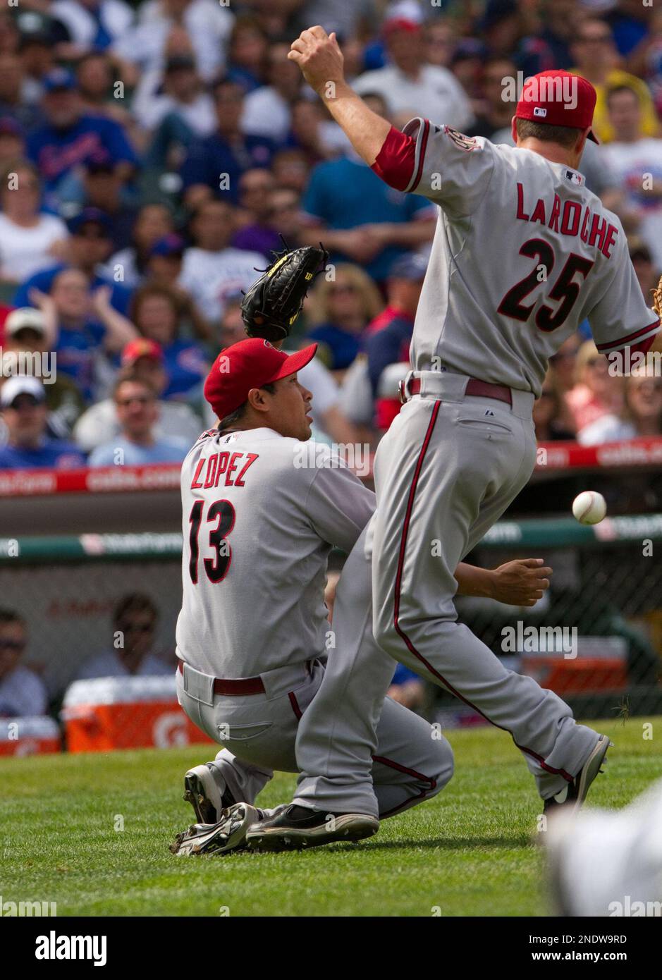 Arizona Diamondbacks pitcher Rodrigo Lopez, left, and first baseman ...