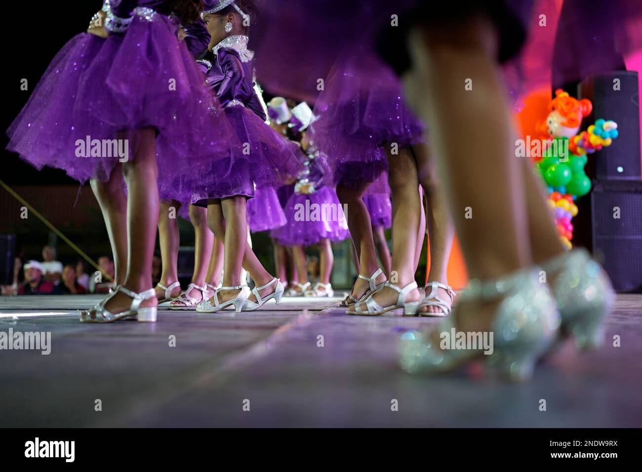 Contestants stand during the Miss Mini Carnival beauty pageant that is ...