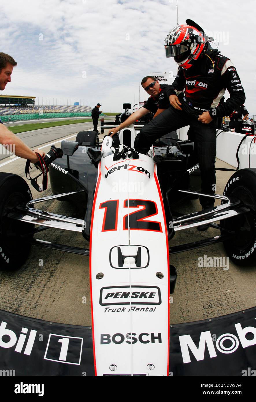 IRL driver Will Power steps into his car before and un-scheduled ...