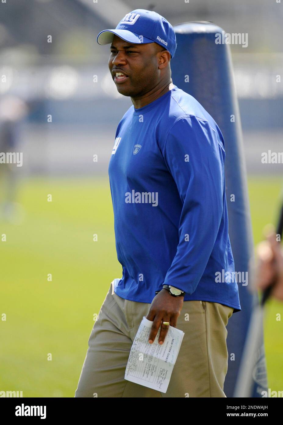 New York Giants defensive coordinator Perry Fewell looks on during rookie football mini-camp ...