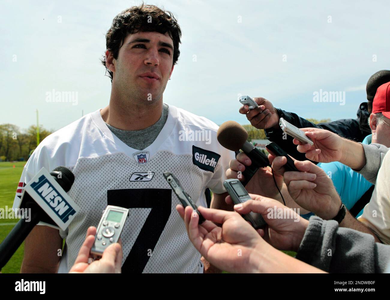 New England Patriots quarterback Zac Robinson (7) faces reporters ...