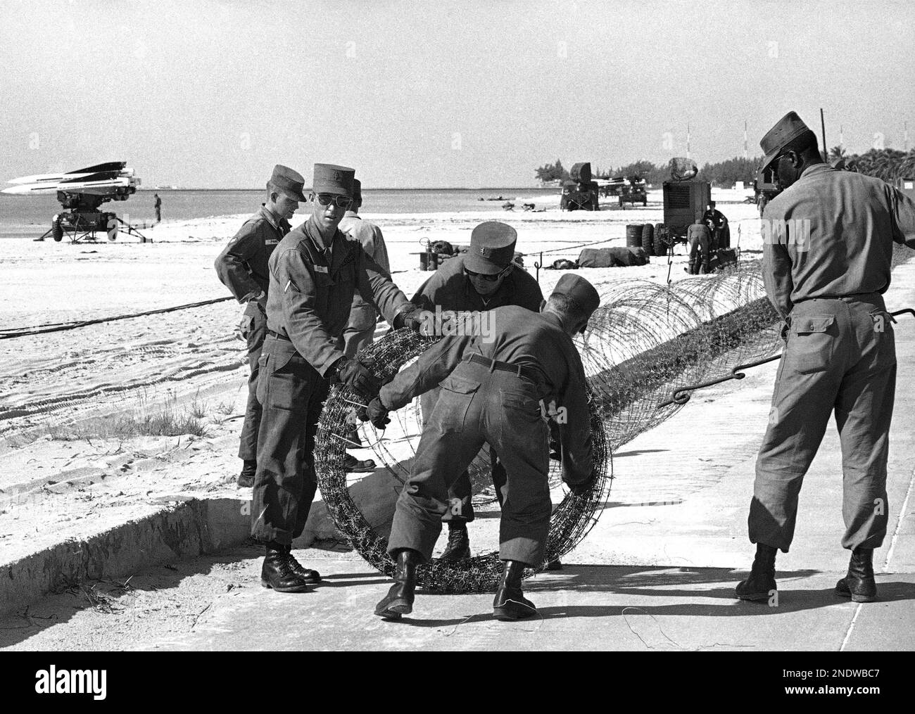 American troops strung barbed wire along the Key West shore facing ...