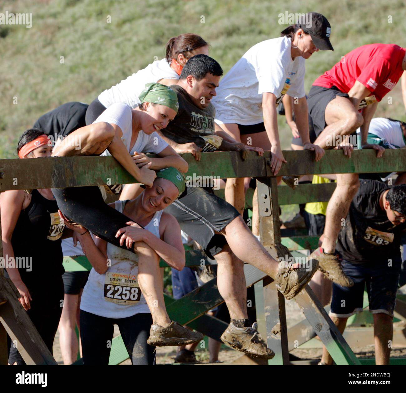 Competitors make their way over Marine Hurdles during the first urban ...