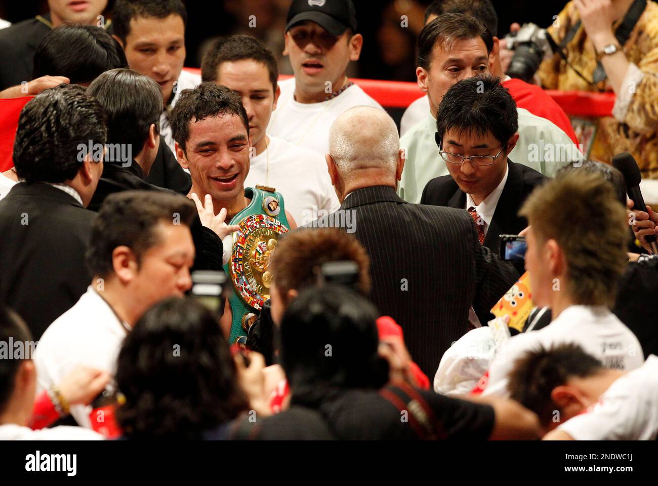 Mexican WBO champion Fernando Montiel wearing the WBC title belt, in ...