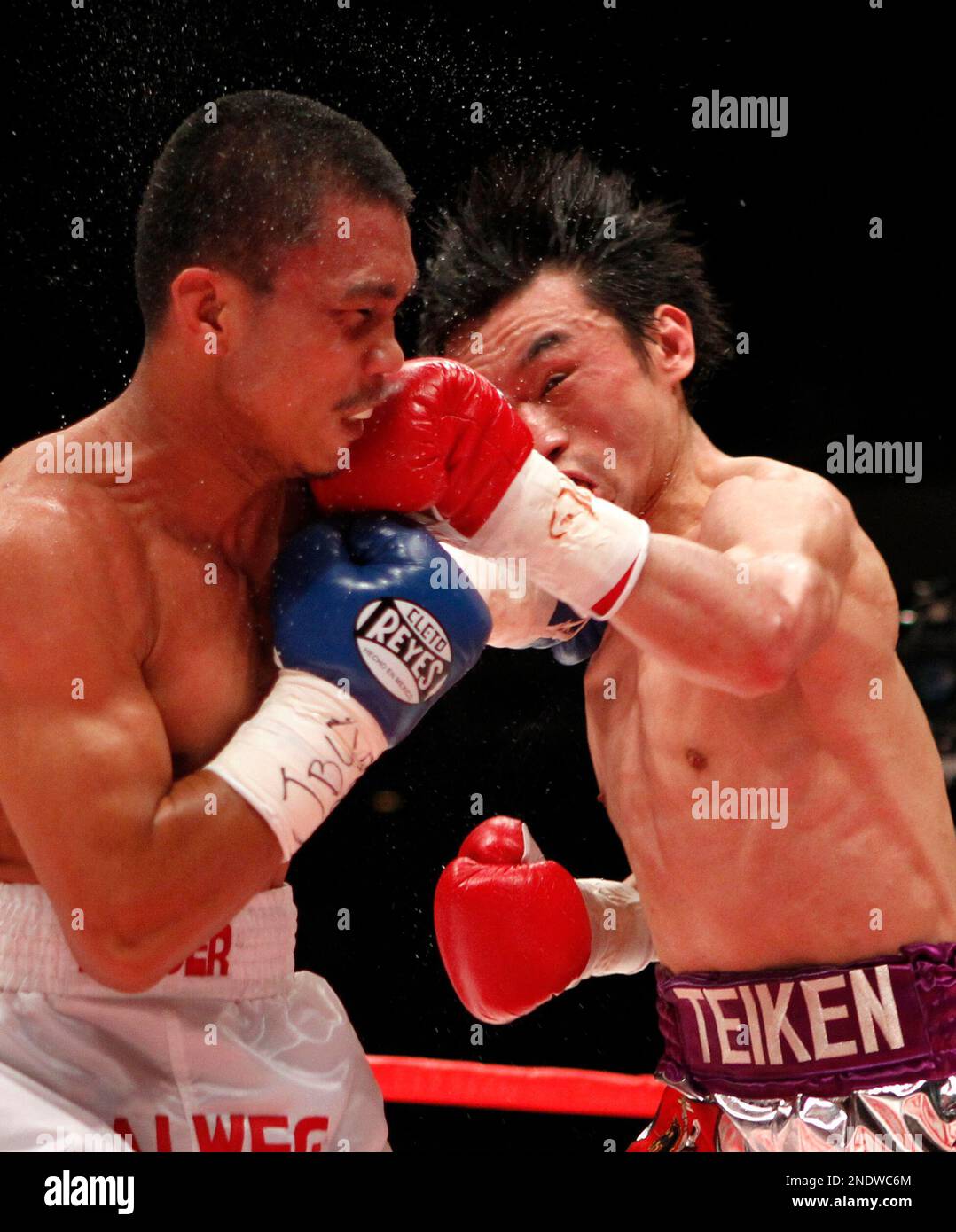 Defending champion Toshiaki Nishioka of Japan, right, hits Philippine ...