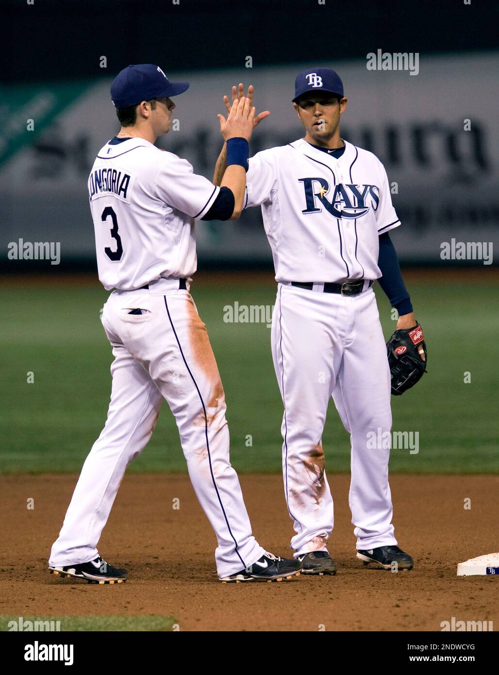 Tampa Bay Rays' Evan Longoria (3) and Jason Bartlett celebrate a 11-1 ...