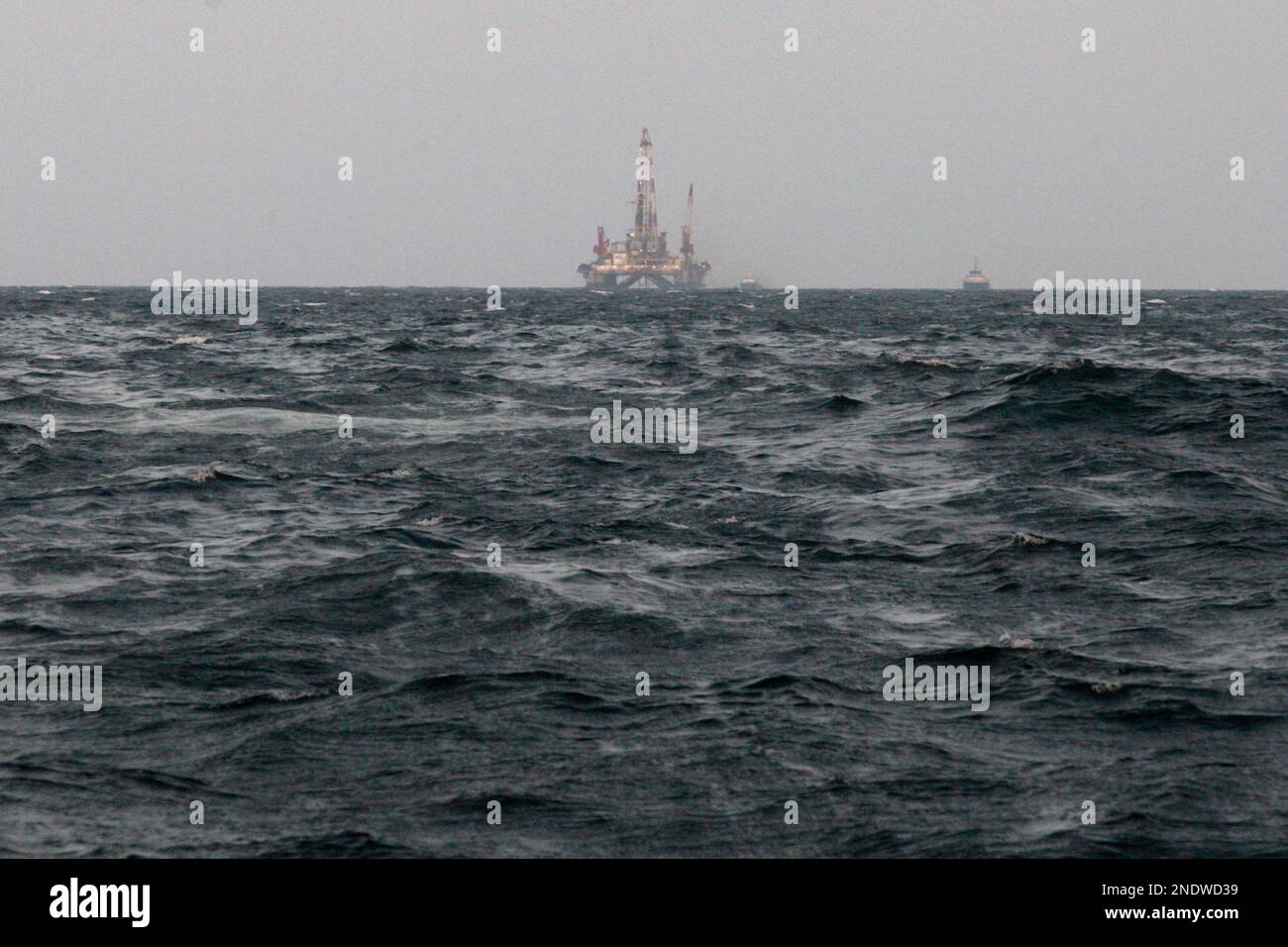 Traces of an oil sheen float on the Gulf of Mexico five and a half ...