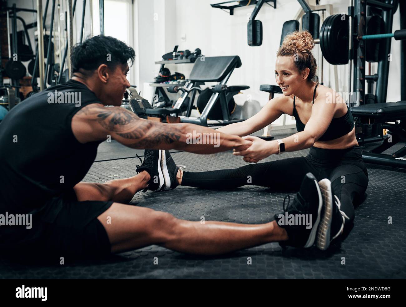 Working out together provides us with the needed motivation. two sporty ...