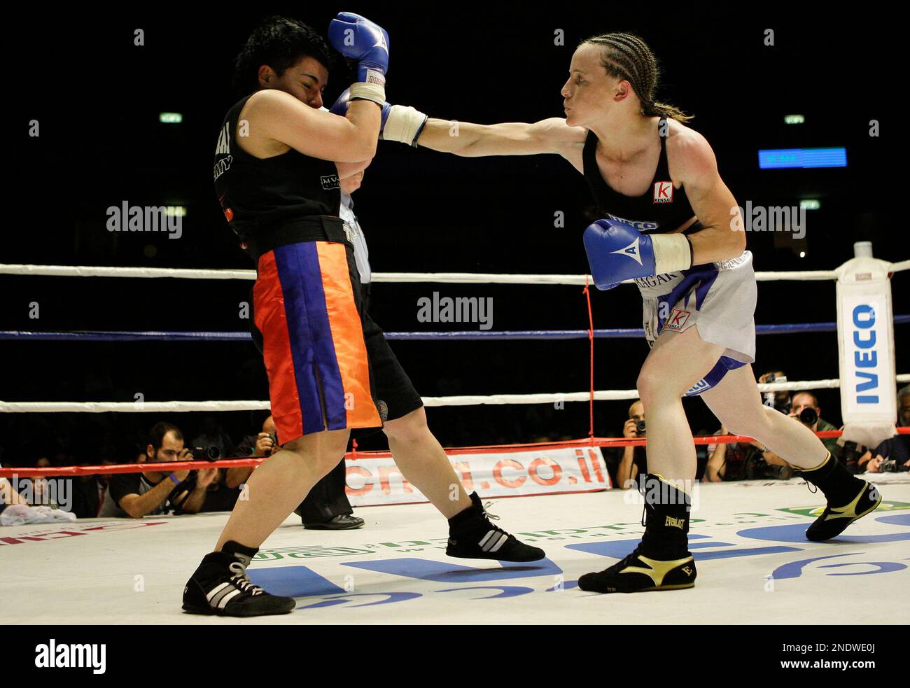 Hagar Finer of Israel, right, lands a punch on Agnese Boza of Armenia ...