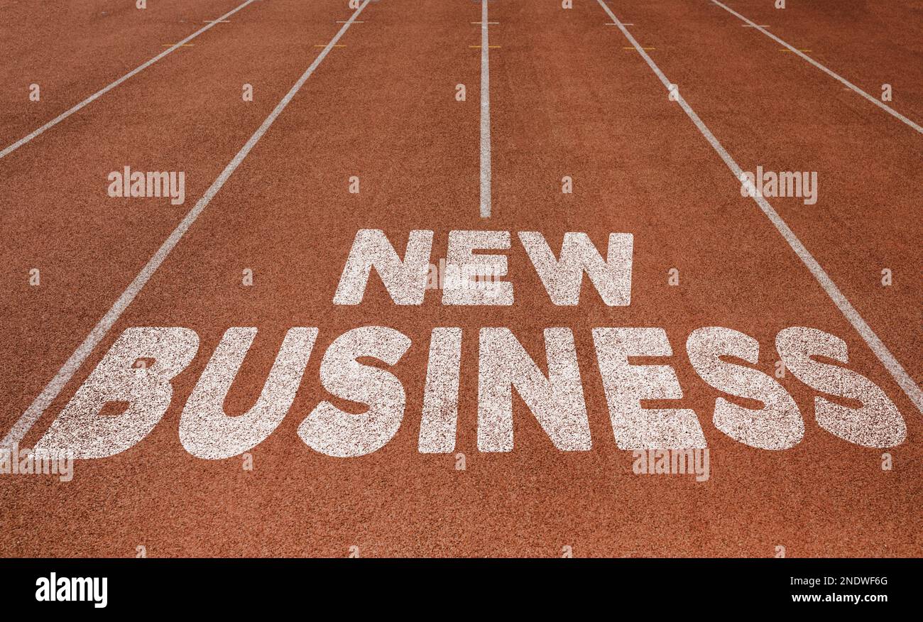 New Business written on running track, New Concept on running track text in white color Stock ...
