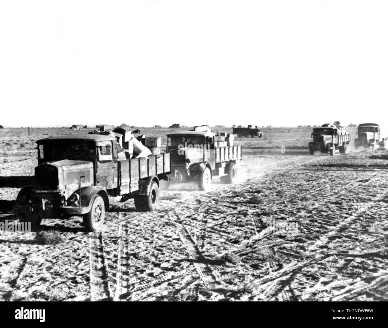 These Italian trucks, loaded with Italian food supplies, roll across ...