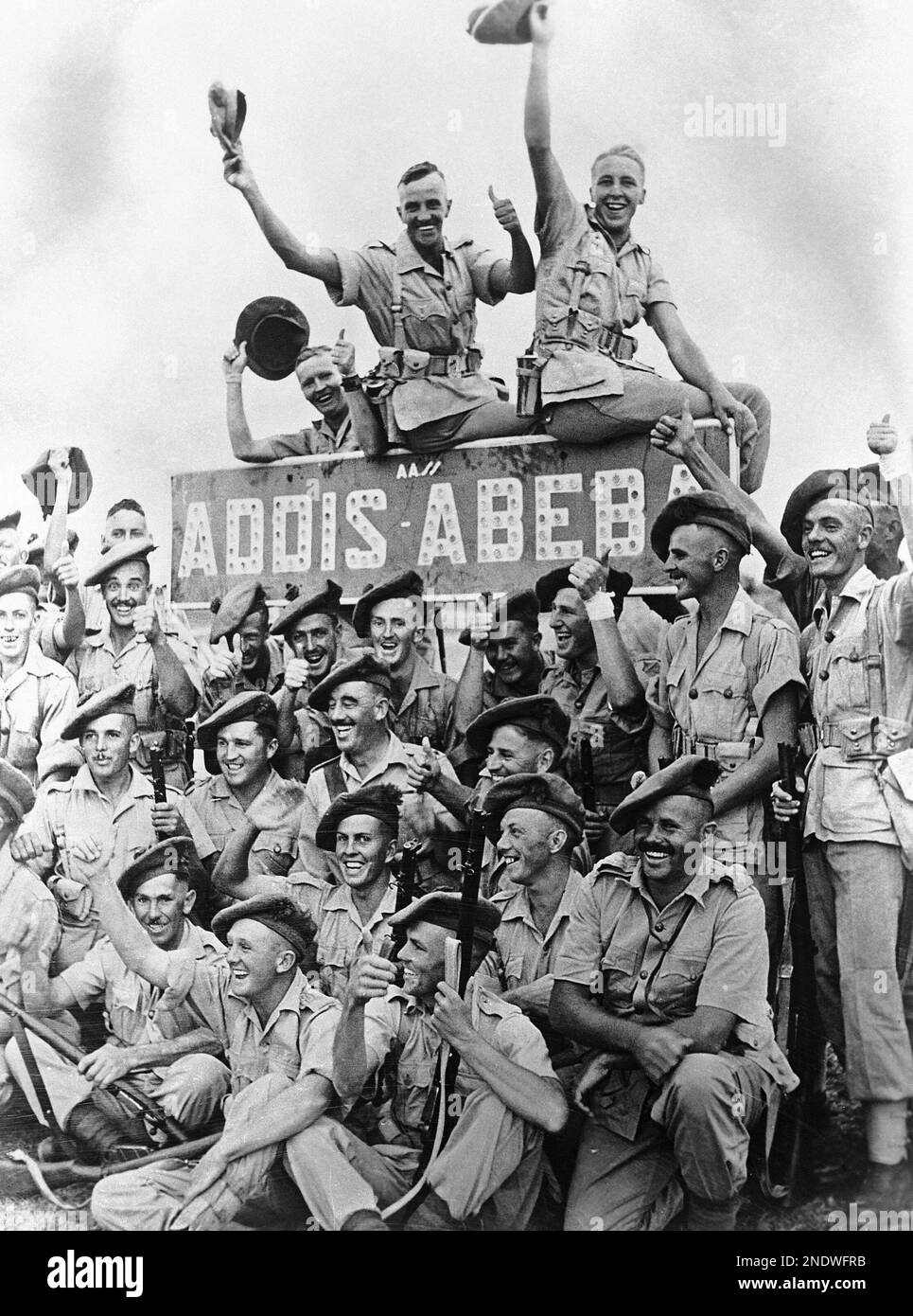 Members of a Transvaal Regiment giving three cheers when they reach ...