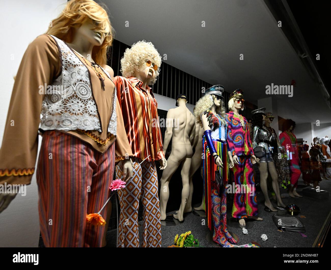 Cologne, Germany. 16th Feb, 2023. Costumes in shop windows are still ...