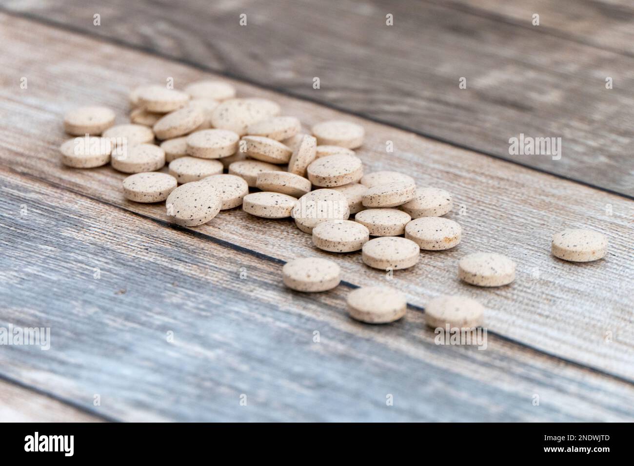 A close-up of brewer's yeast pills used in beer and bread production on ...