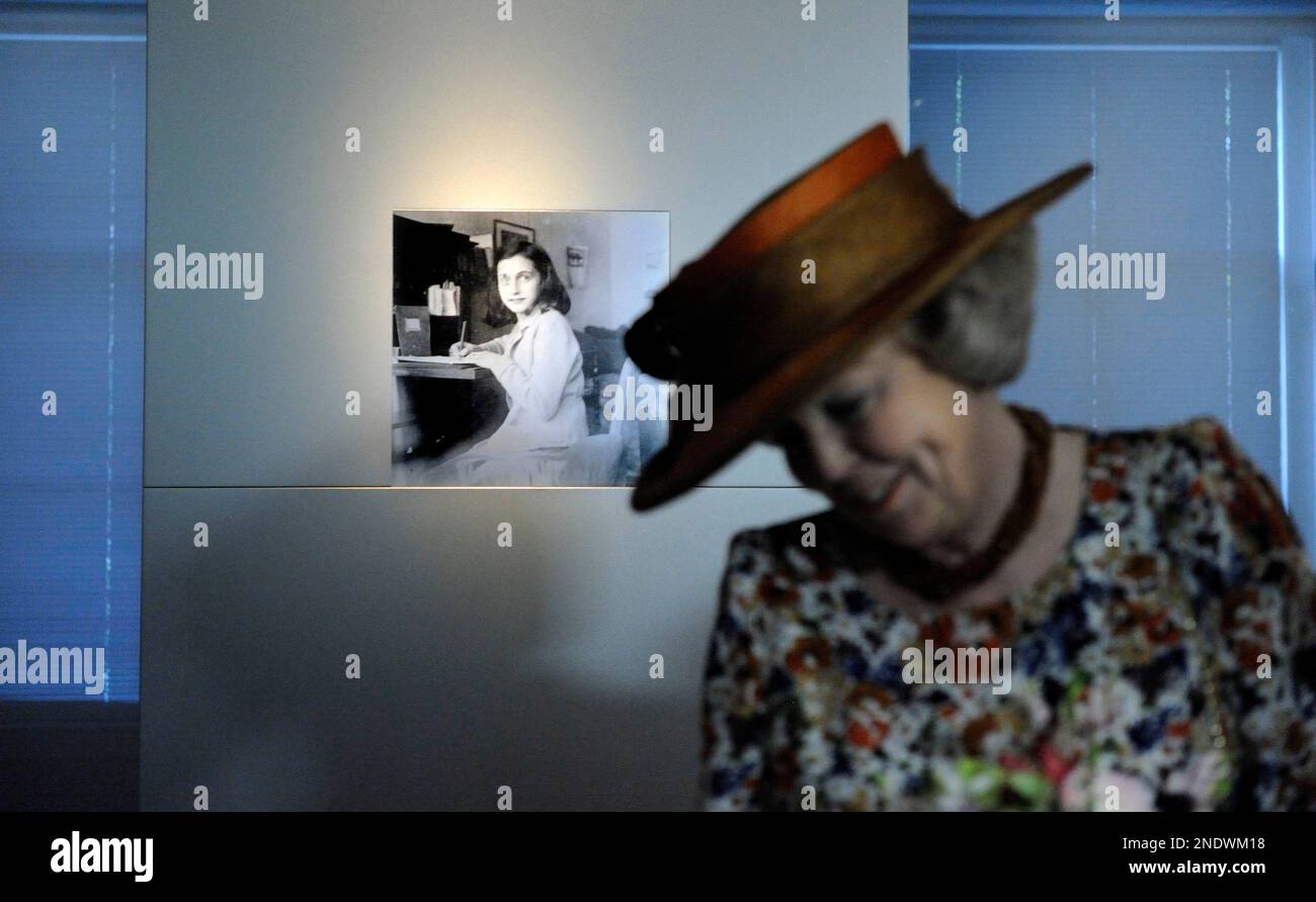 Dutch Queen Beatrix is seen near a portrait of Anne Frank at the Anne ...
