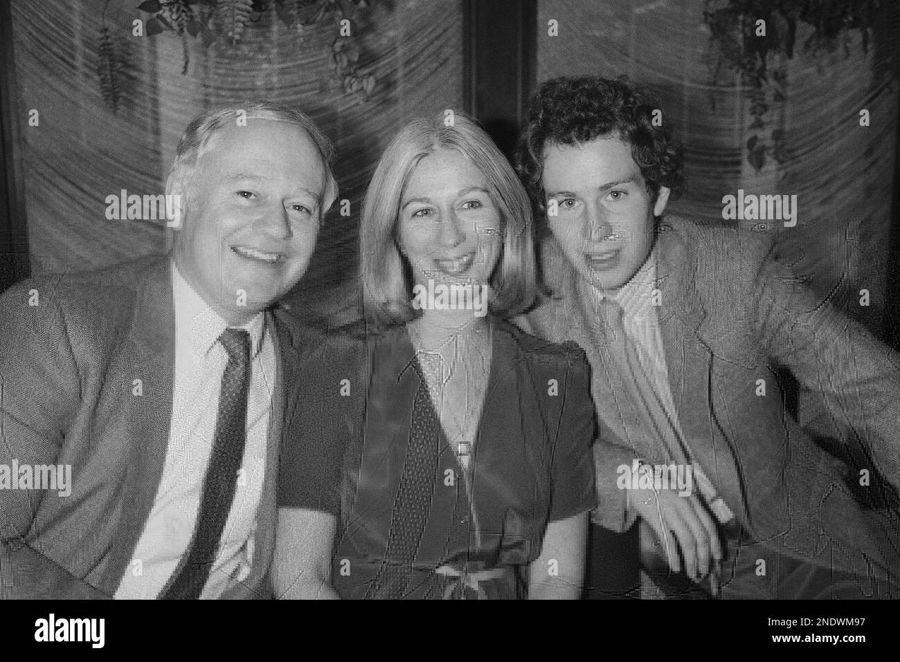 Tennis star John McEnroe, Jr., poses with his father, John, Sr., and ...