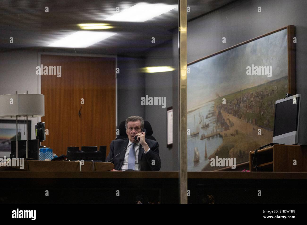 Toronto Mayor John Tory makes a telephone call from his office after ...