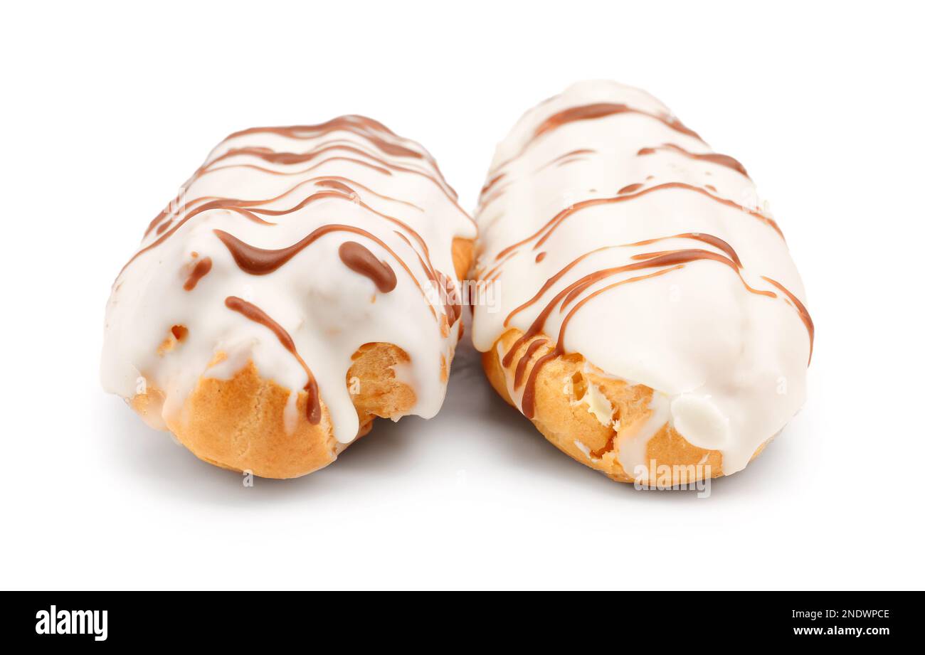 Yummy eclairs isolated on white background Stock Photo - Alamy