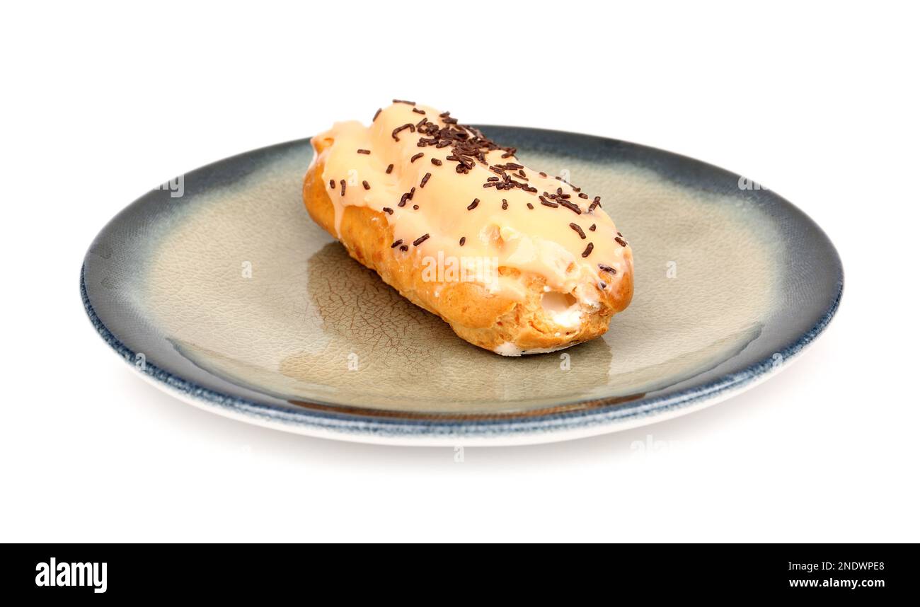 Plate with delicious eclair isolated on white background Stock Photo ...