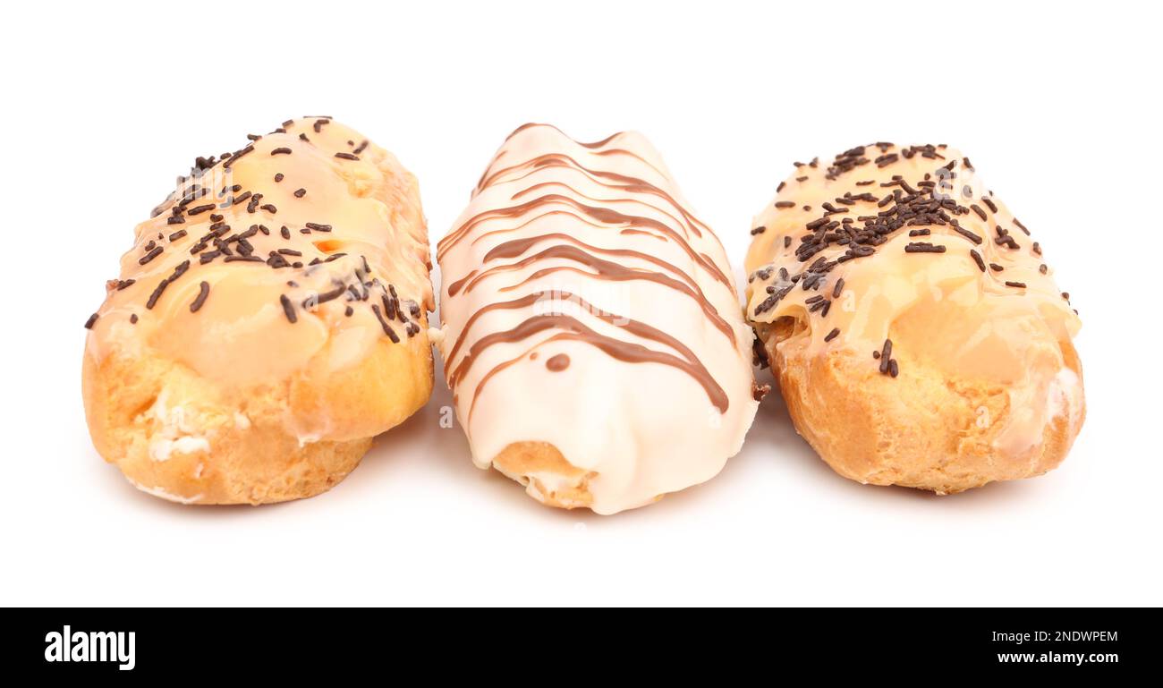 Yummy eclairs isolated on white background Stock Photo - Alamy