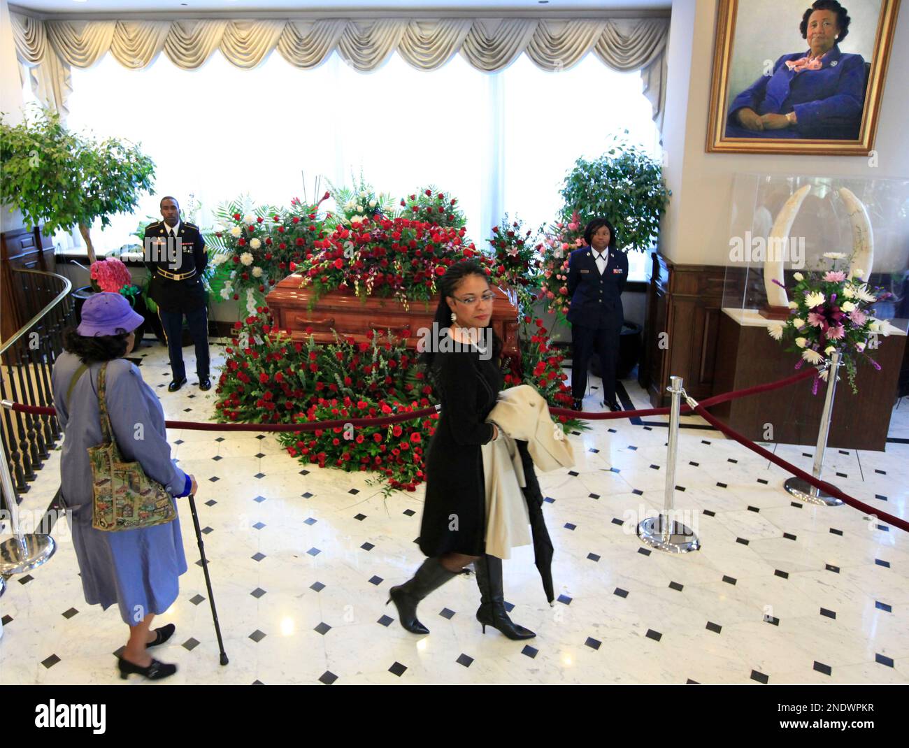 Mourners file past the casket bearing Dorothy Height, the leading ...