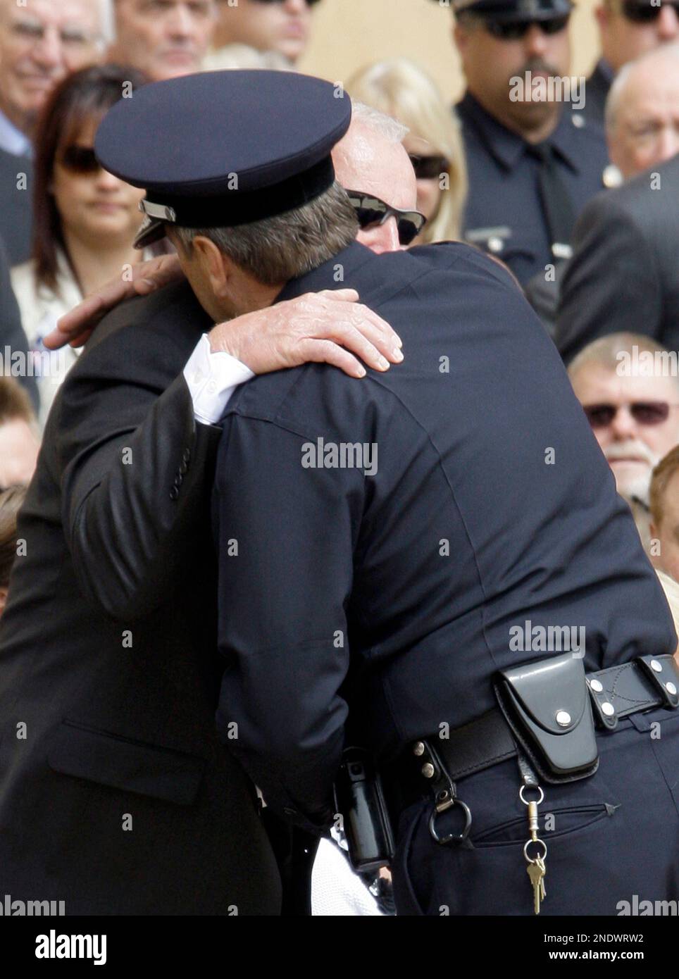 Los Angeles Police Chief Charlie Beck, in uniform, and Steve Gates ...