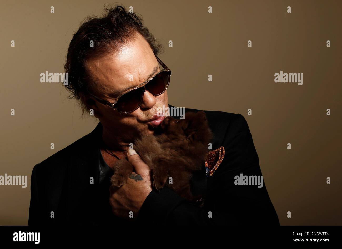 Actor Mickey Rourke from the upcoming film "Iron Man 2" poses for a ...