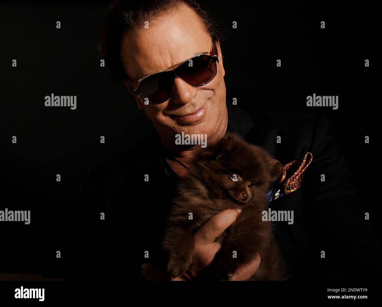 Actor Mickey Rourke from the upcoming film "Iron Man 2" poses for a ...