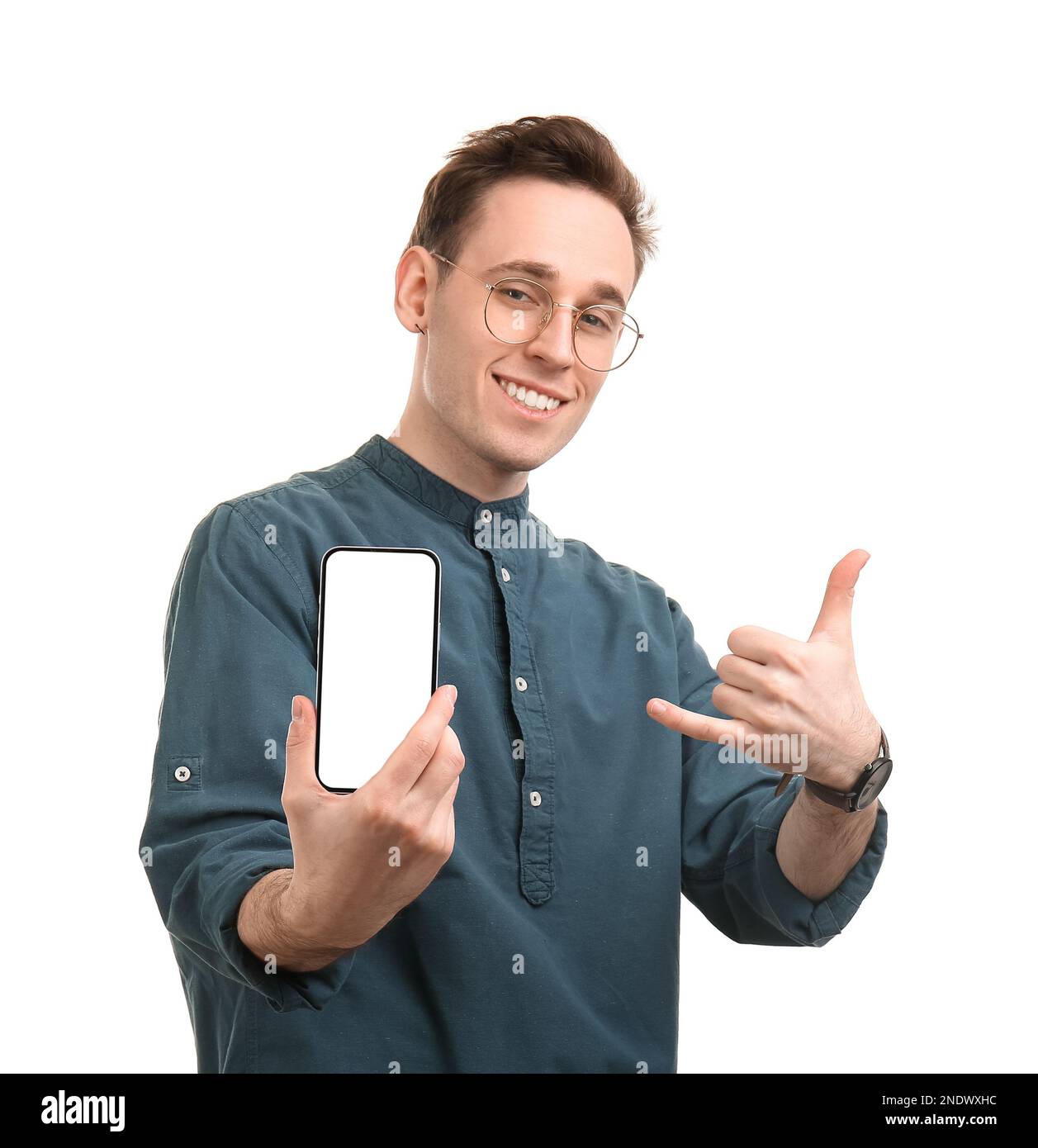 Cool young man with smartphone on white background Stock Photo - Alamy