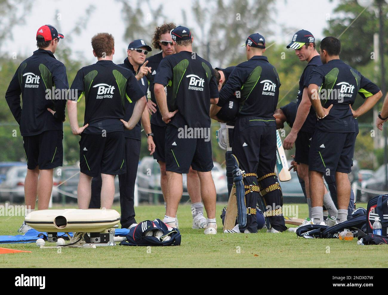 England's coach Andrew Flower, third left, and player Ryan Sidebottom ...