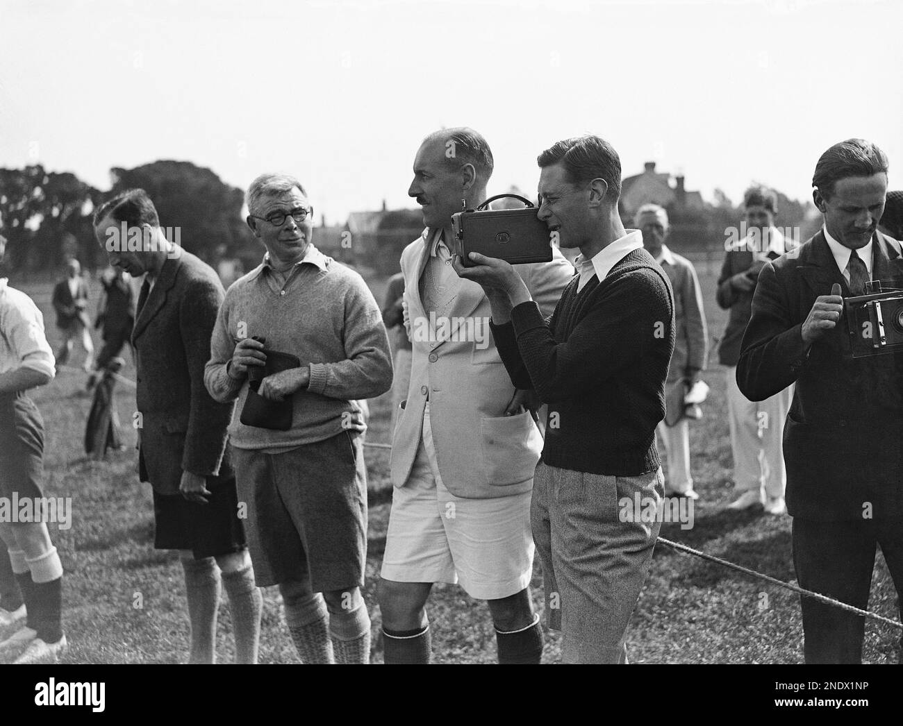 Britain's Prince Albert, The Duke of York making use of his cine-camera ...